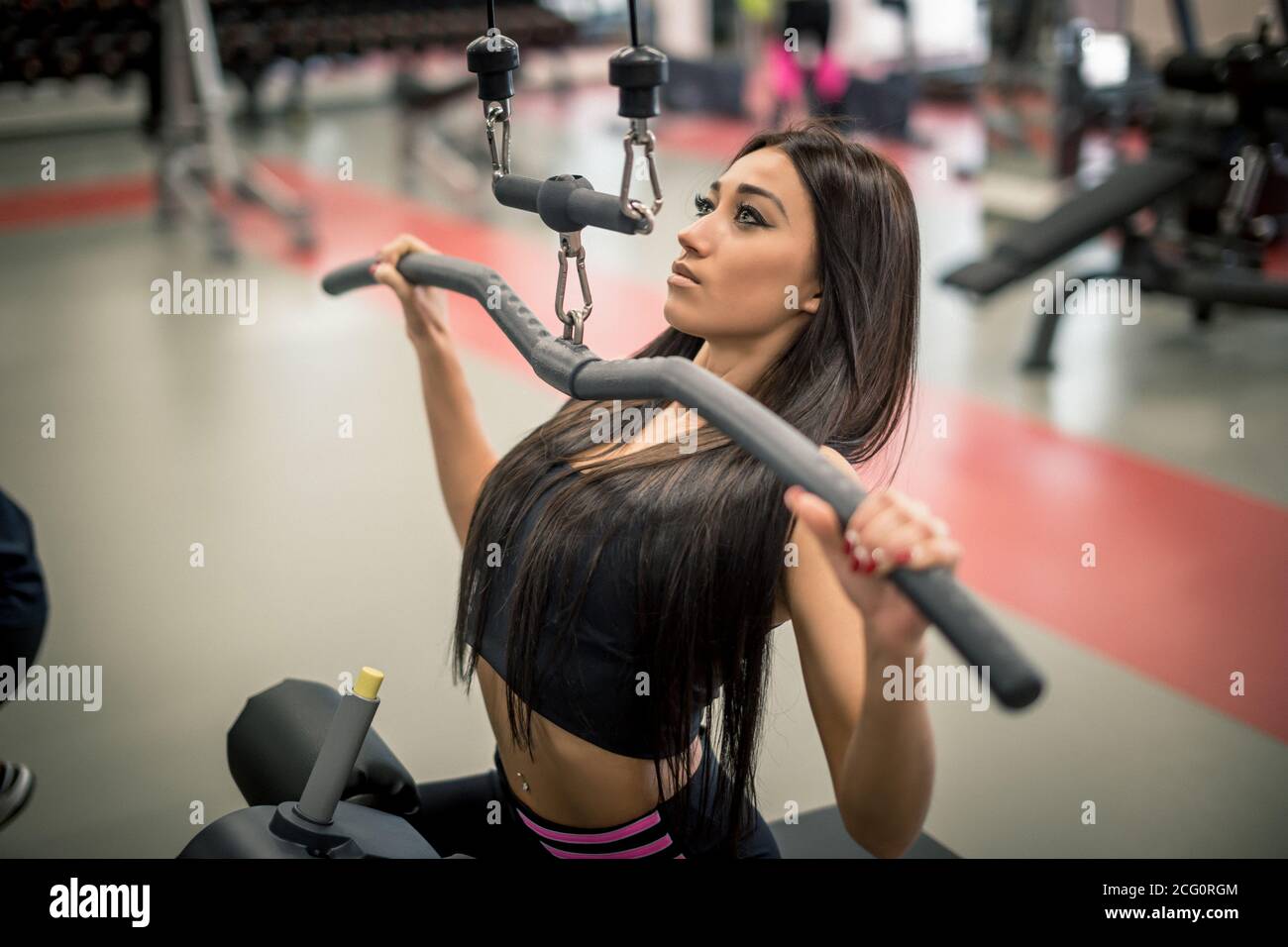 sport, fitness, teamwork and people concept - young woman flexing ...