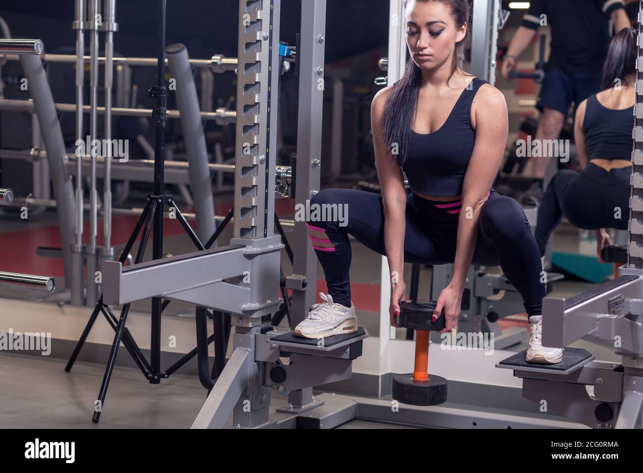 Women flexing muscles in gym hi-res stock photography and images - Alamy