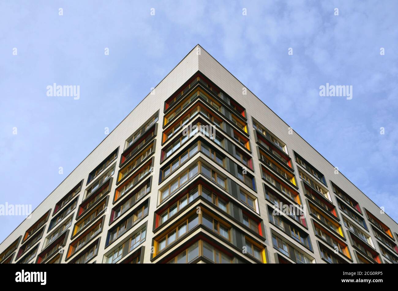 Glass multicolored square windows of the facade of a skyscraper of a ...