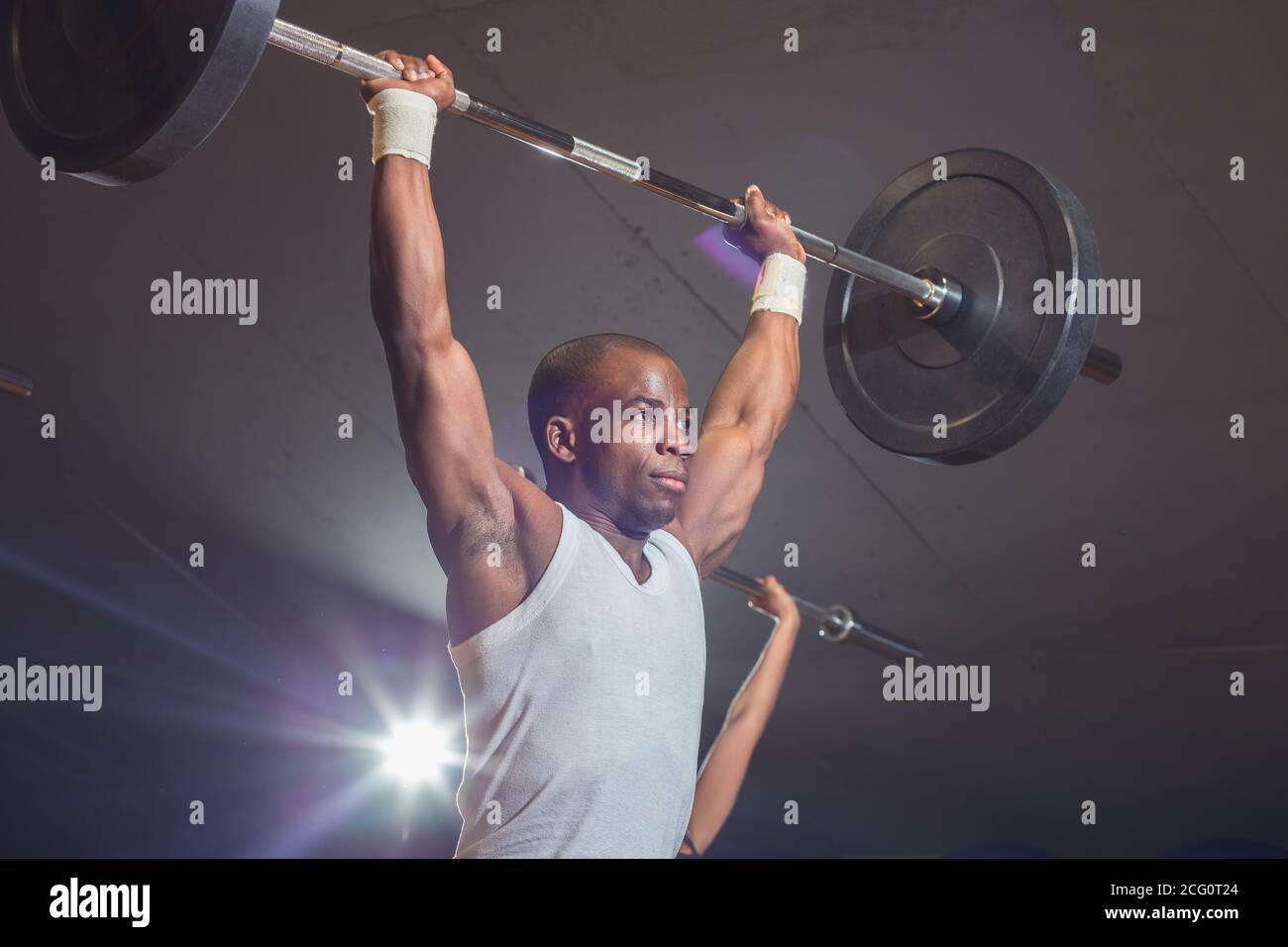 happy african man working out with barbell Stock Photo - Alamy