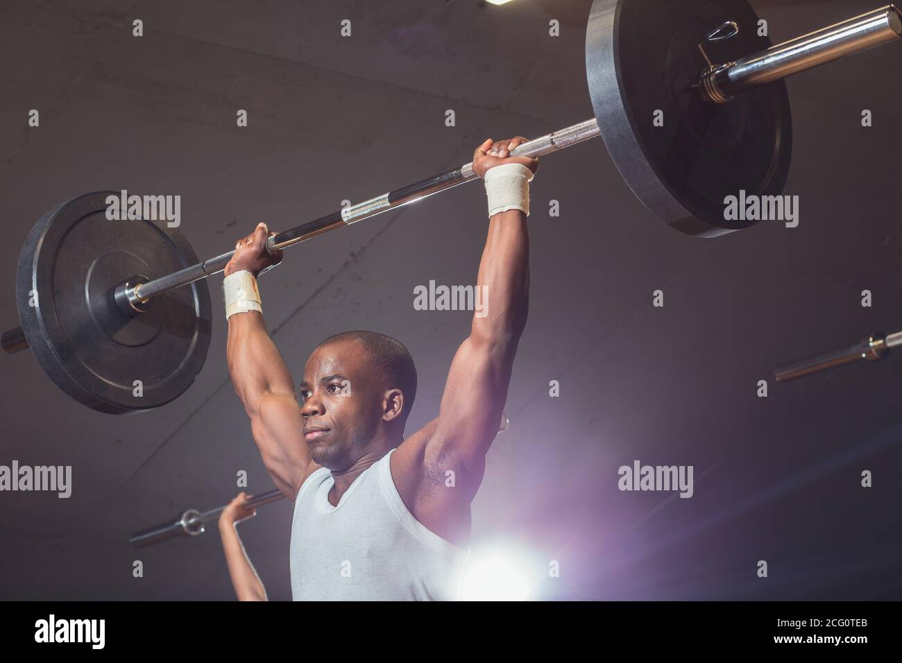 happy african man working out with barbell Stock Photo - Alamy
