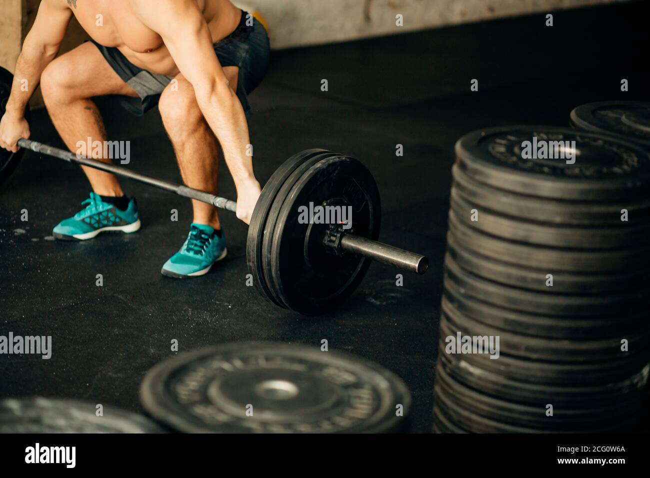 Close up view of barbell on floor in gym Stock Photo - Alamy