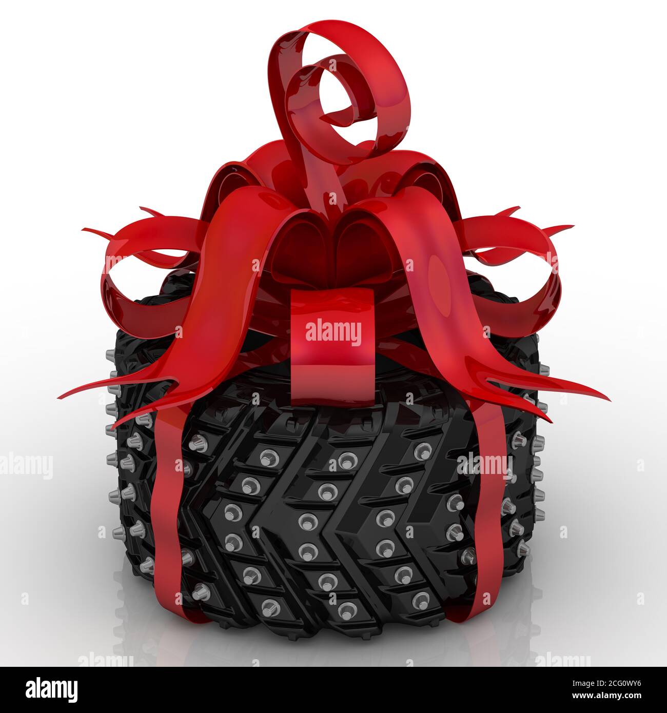 Studded tire as a gift. Studded tire tied with a red ribbon and bow ...