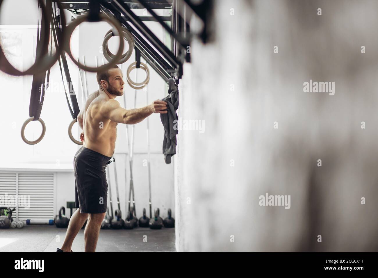 Fitness dip ring man prepare to workout at gym dipping exercise Stock ...