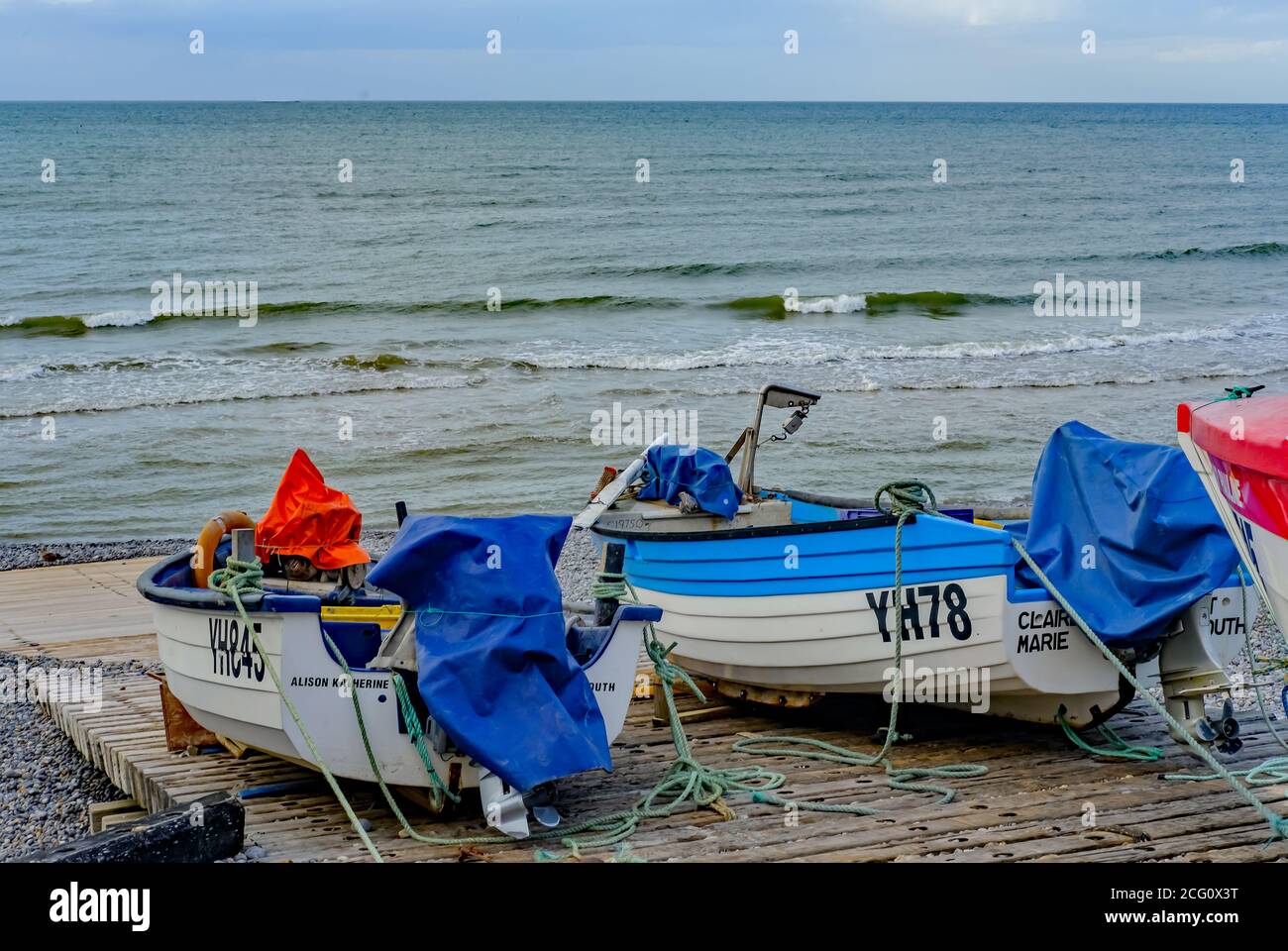 Fishing boats moored up on Sheringham beach on the North Norfolk coast ...