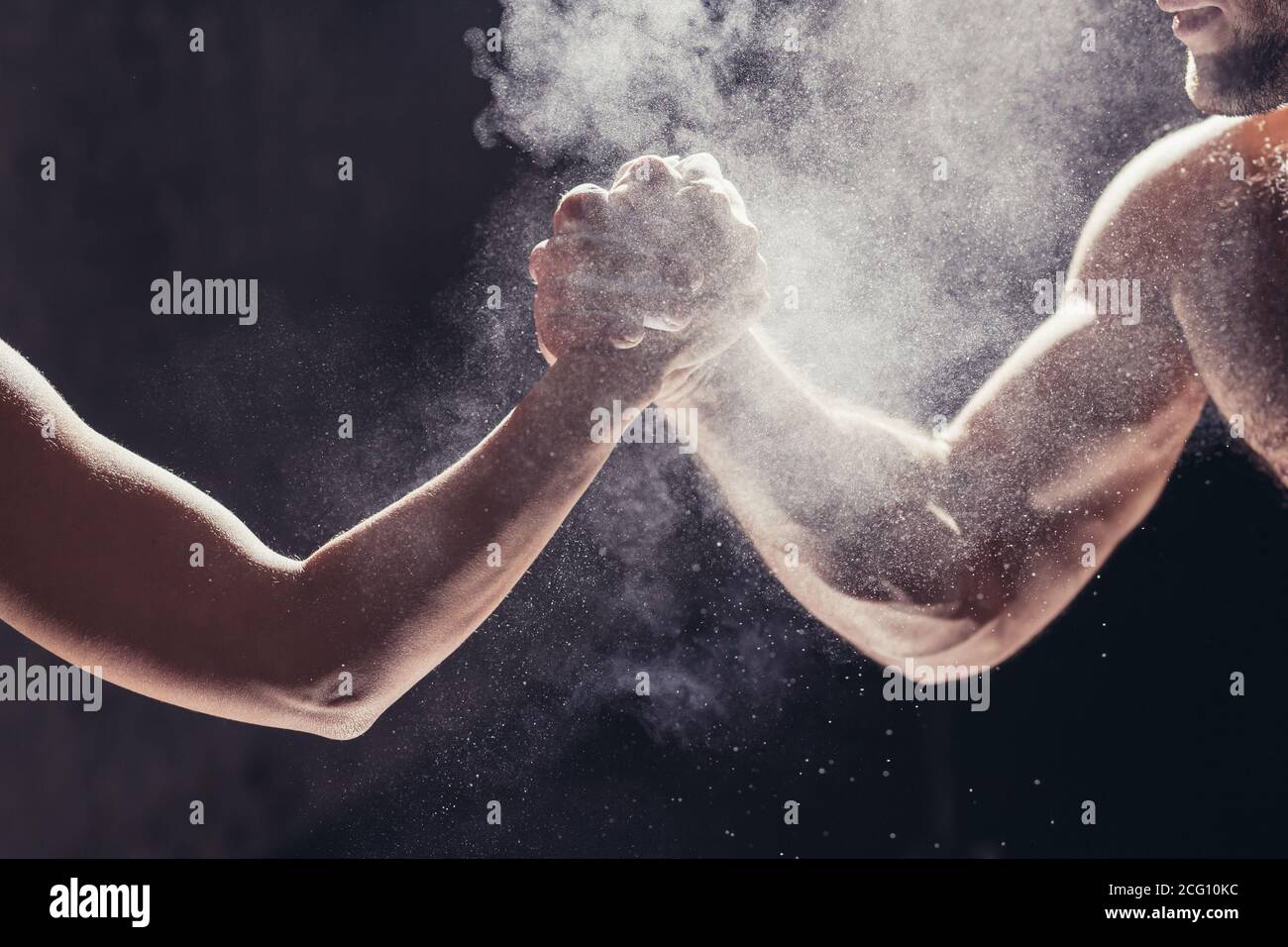 practicing cross fit training in gym. togetherness Stock Photo - Alamy