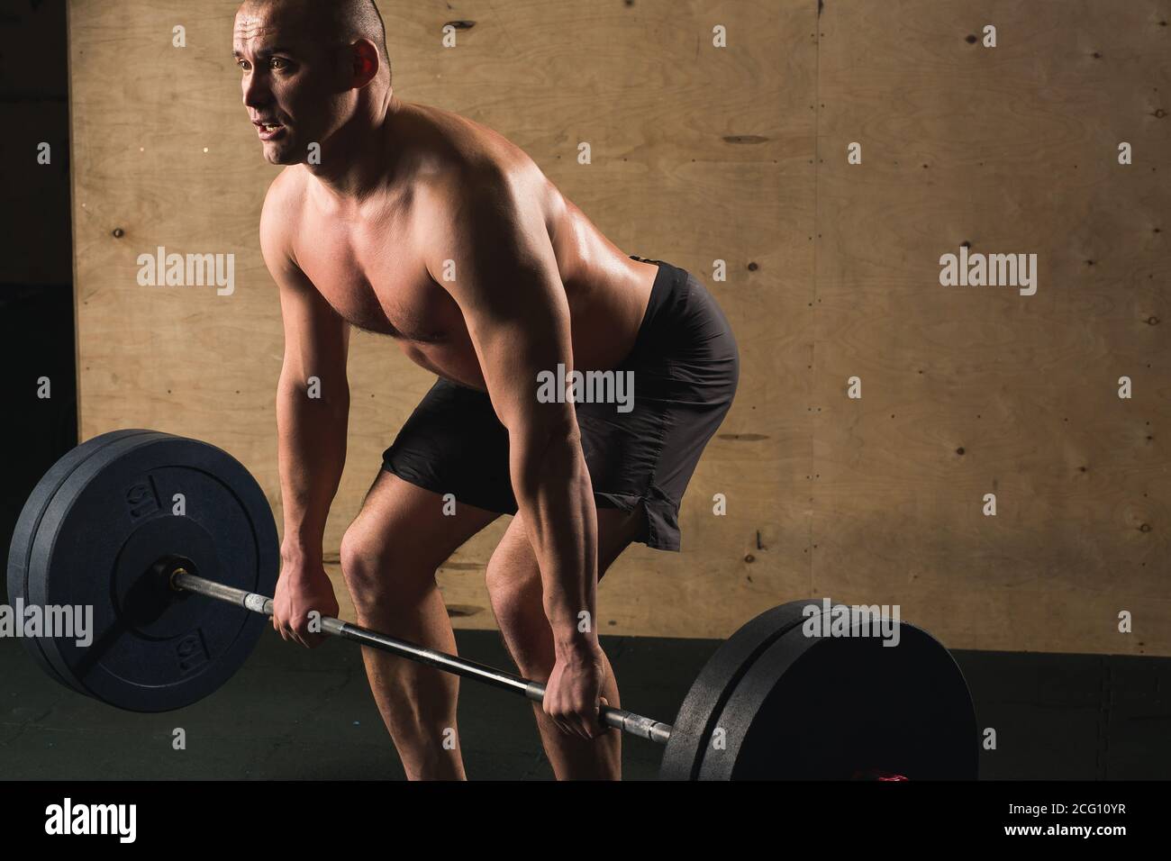 The Deadlift. Man Performing Heavy Deadlift In A Gym Stock Photo - Alamy