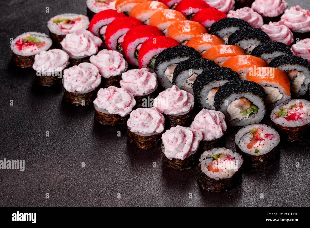 Fresh sushi rolls prepared from the best varieties of fish and seafood ...