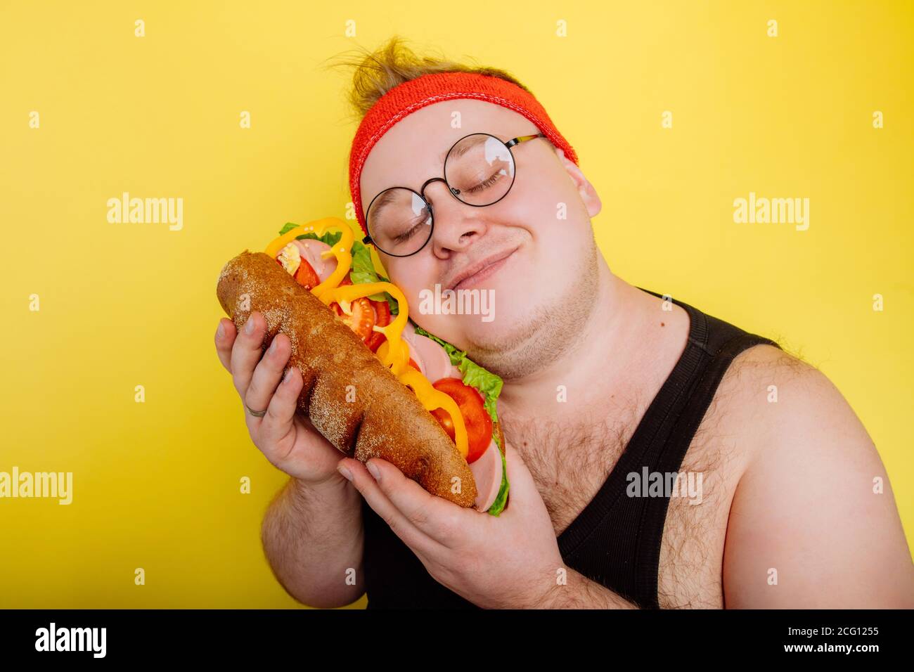 fat funny man hugs a huge burger Stock Photo - Alamy