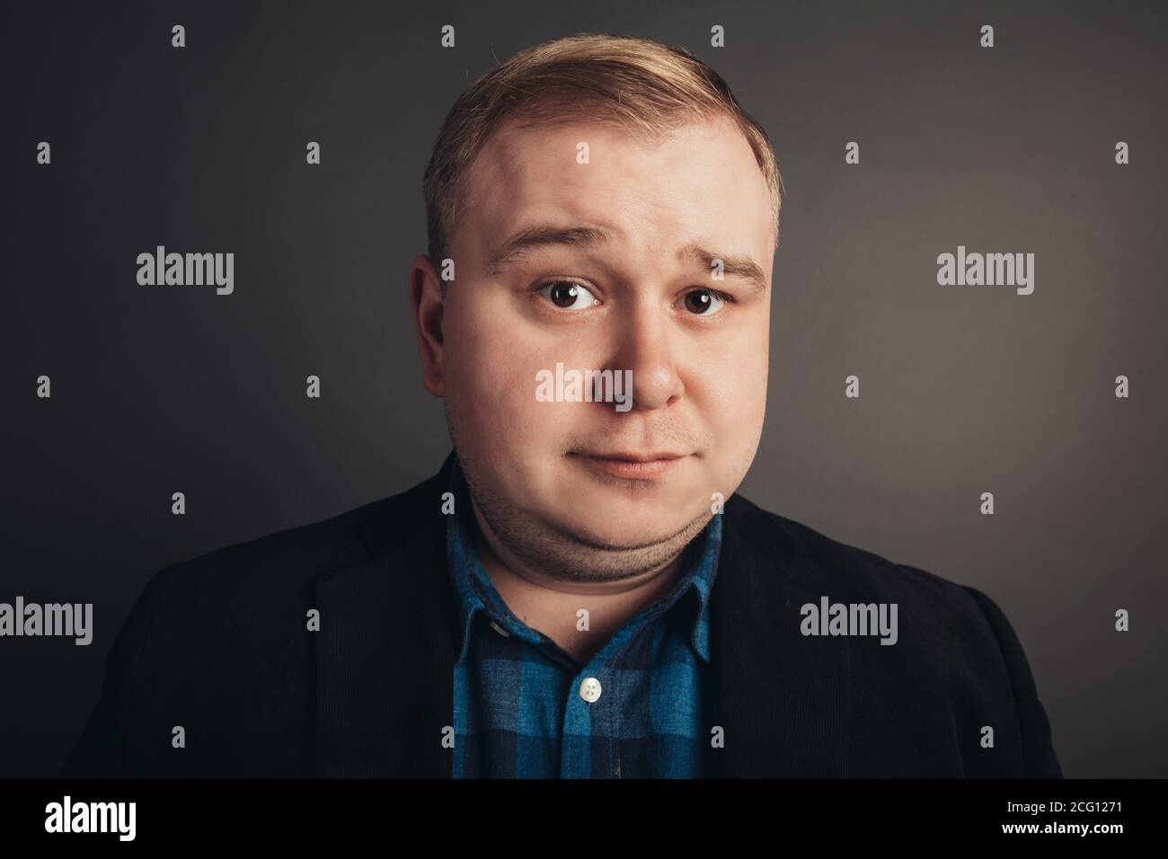 confident caucasian fat man looking at camera Stock Photo - Alamy