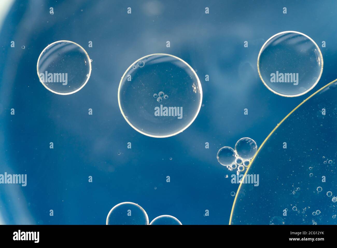 Abstract oily background blue hi-res stock photography and images - Alamy