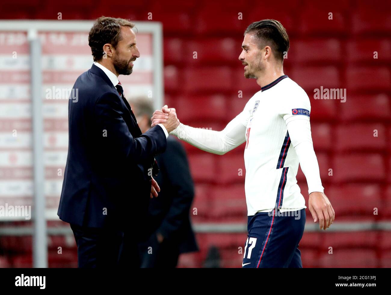 England manager Gareth Southgate (left) shakes hands with Jack Grealish ...