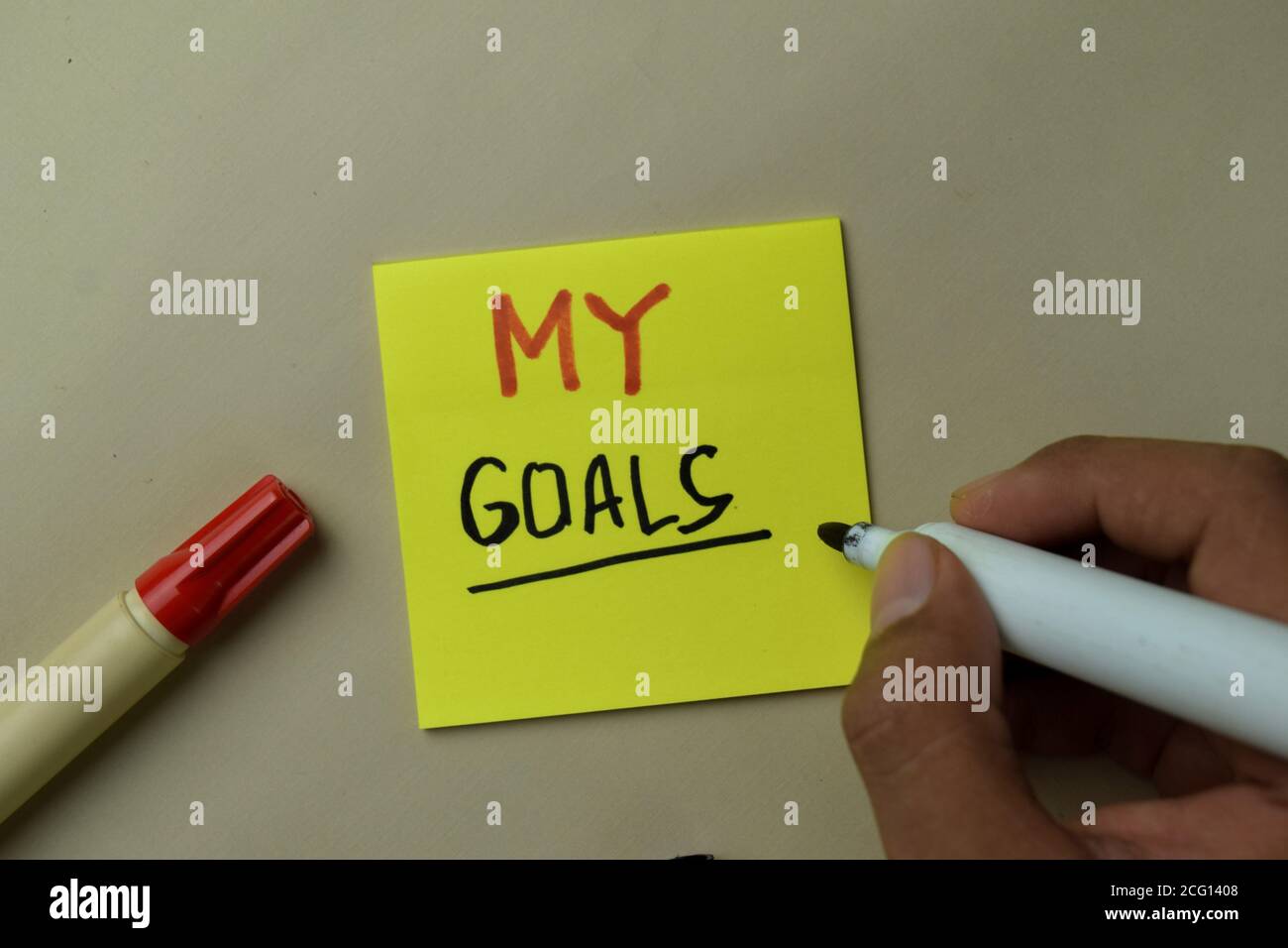 My Goals write on sticky notes isolated on office desk Stock Photo - Alamy