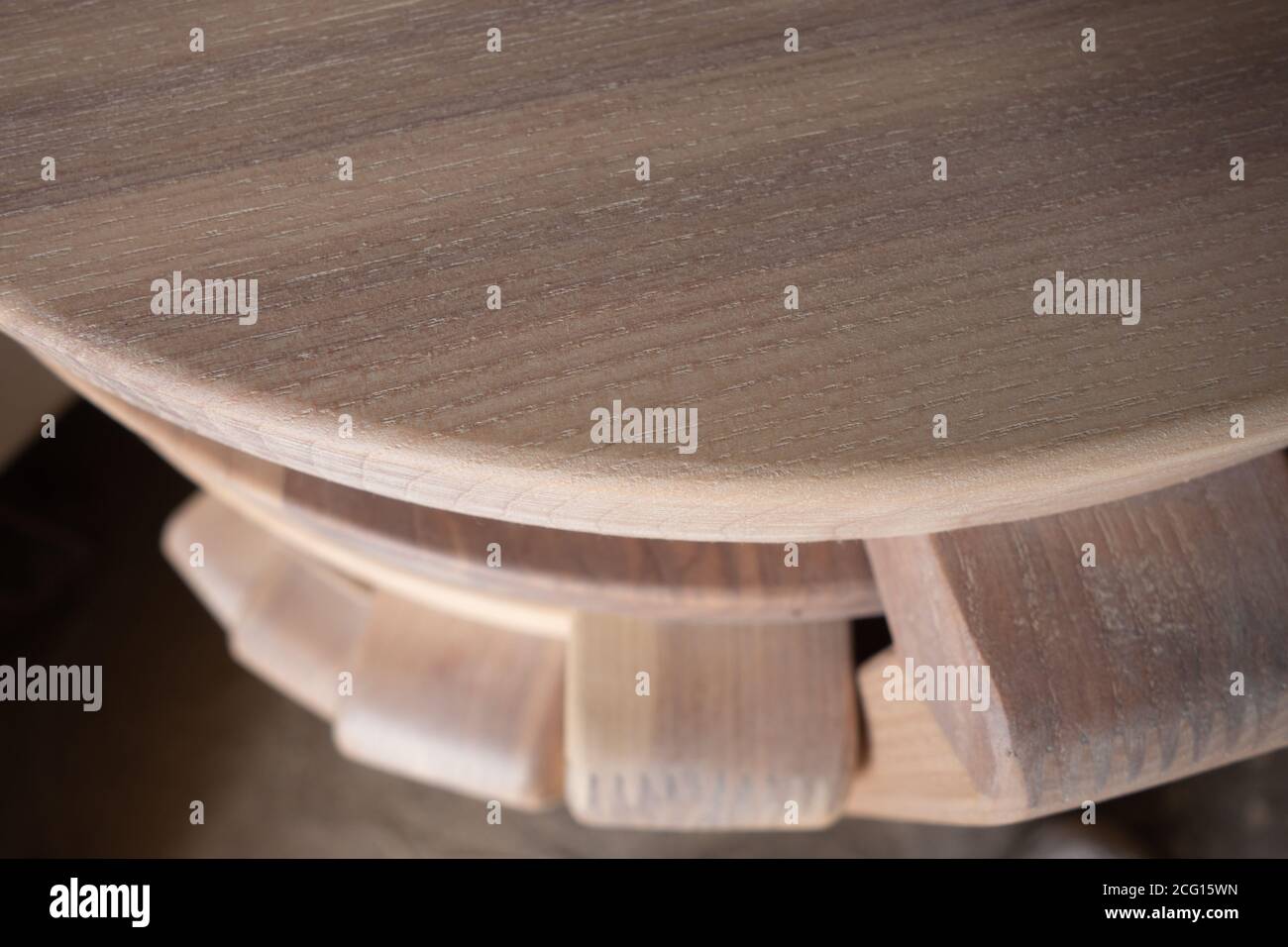 Five natural wood stools, close-up in one pile. Natural wood texture ...