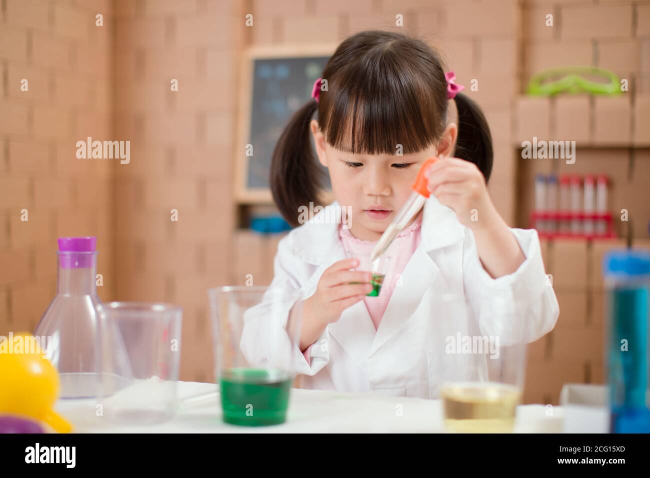 young girl play science experiments for homeschooling Stock Photo - Alamy