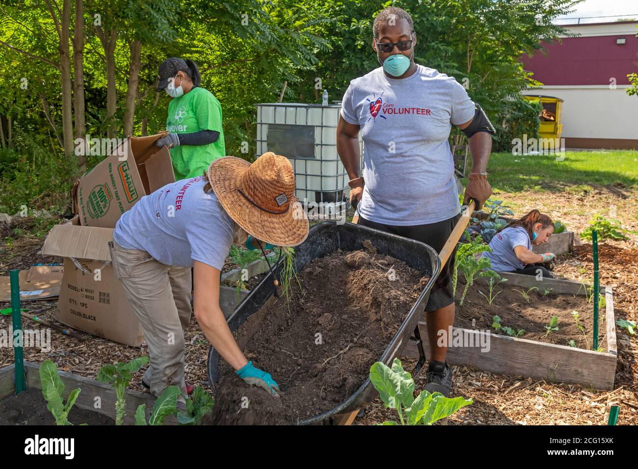 Detroit, Michigan - Volunteers work in the Grassroots Garden, a ...
