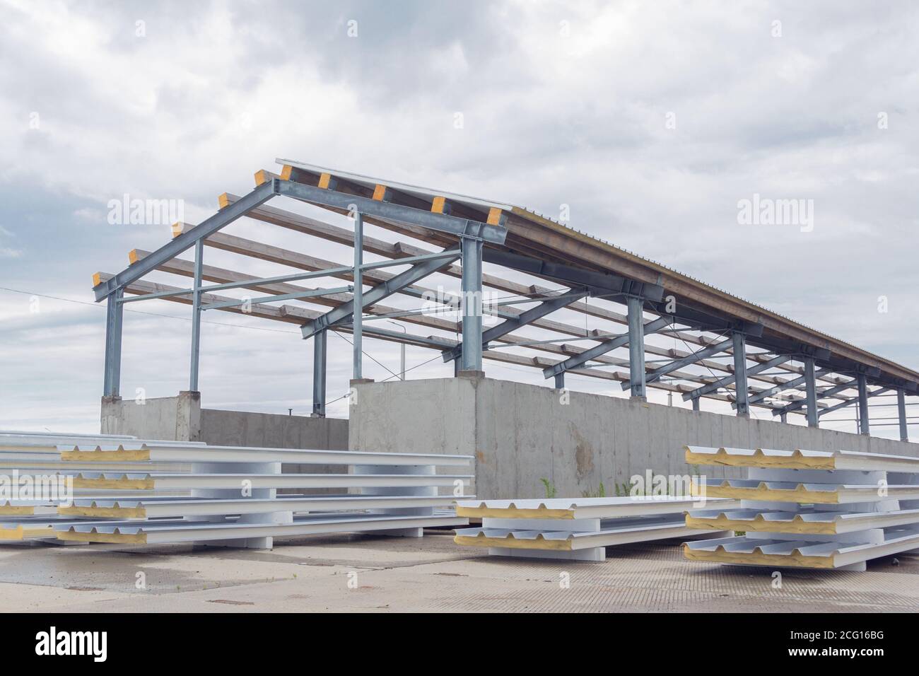 Metal frame of the building with a sandwich panel of insulation on the ...