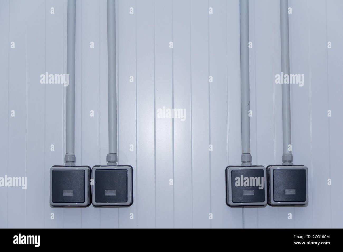 The waterproof light switch is mounted on the sandwich panel wall ...