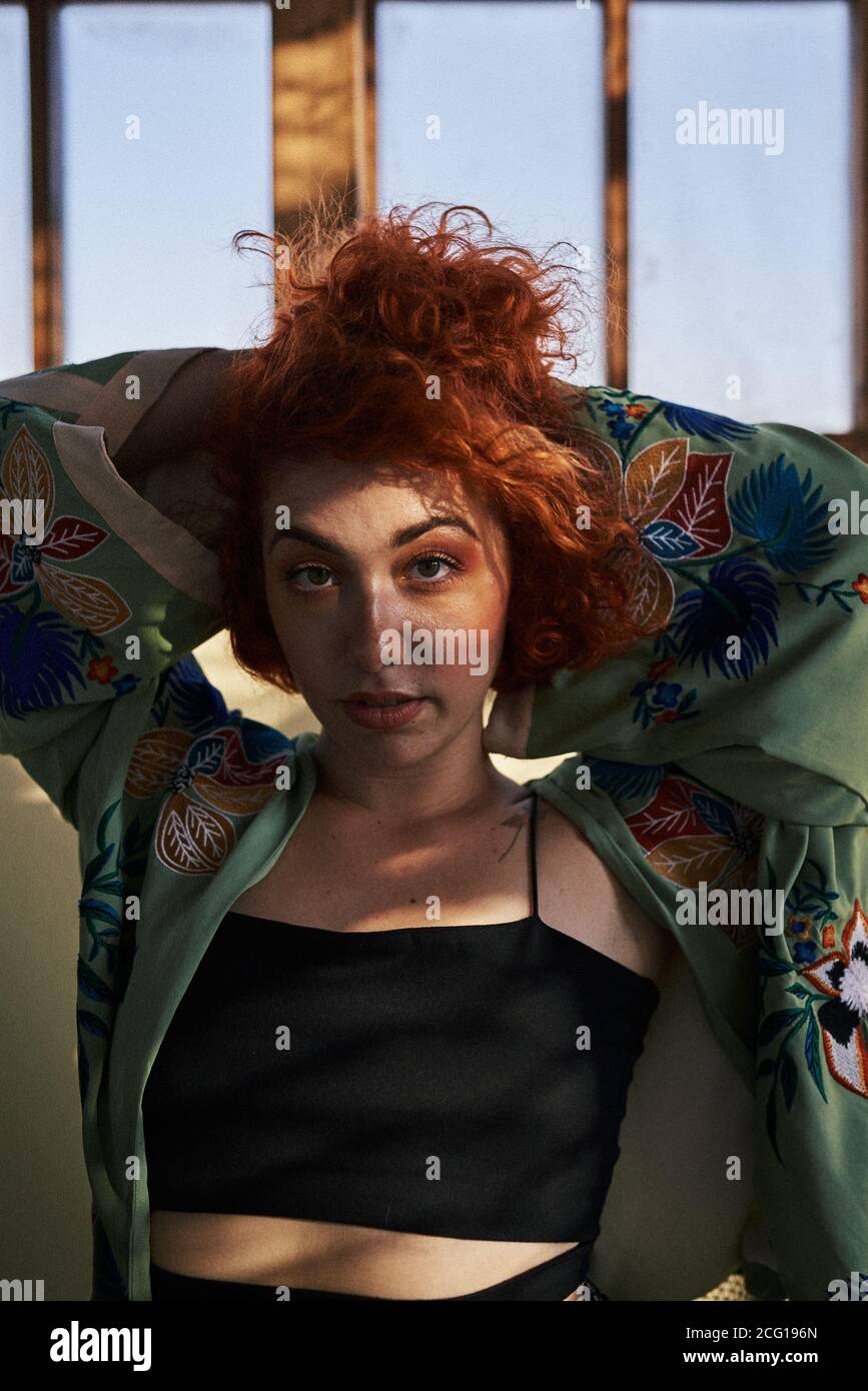 Young alternative redhead girl's portrait with green eyes Stock Photo ...