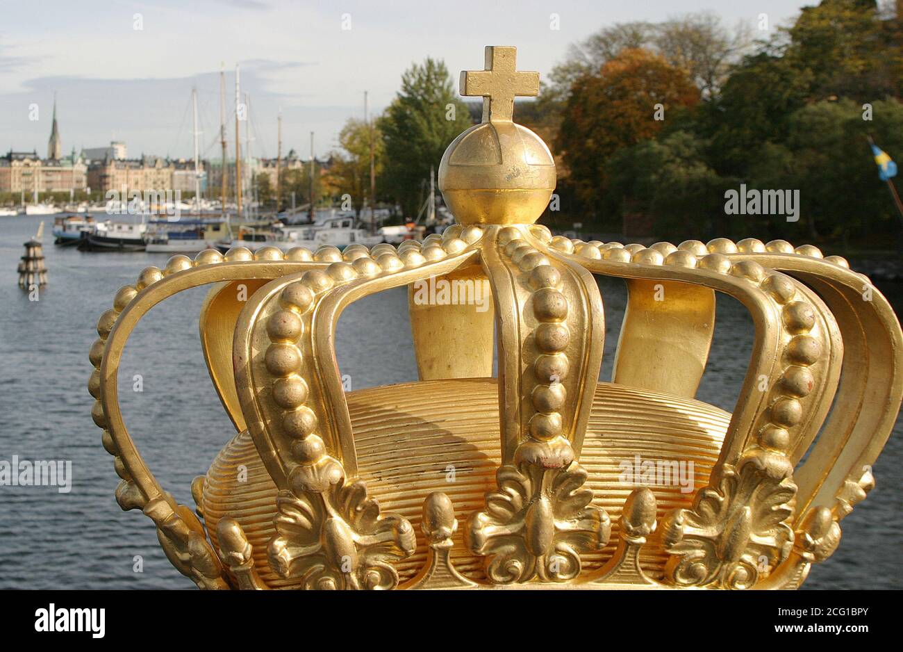 Royal symbol Sweden, gold crown on Skeppsholmbron Stockholm with ...