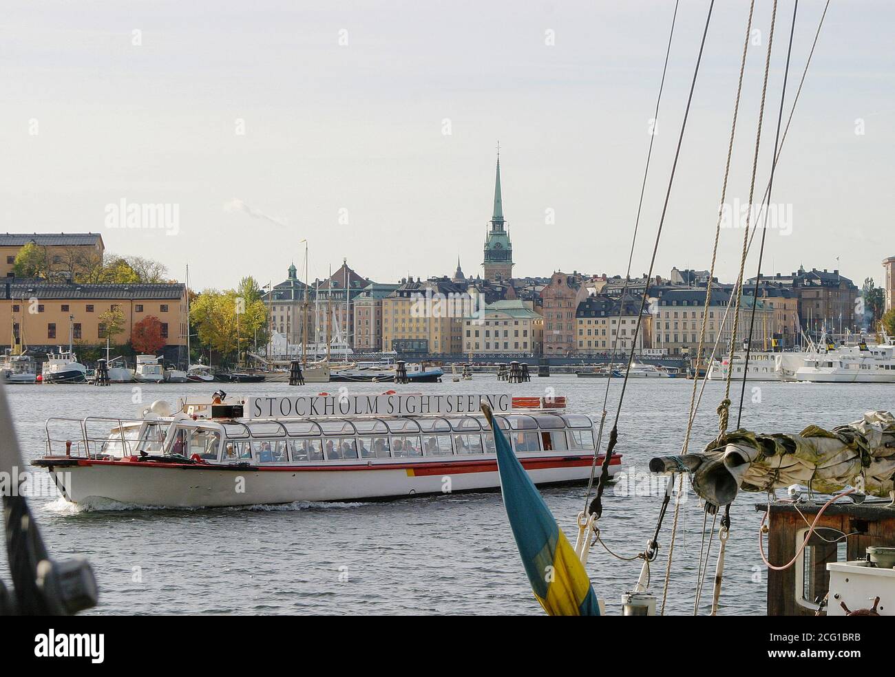 Gamla Stan viewed from Strandvagen as tourists on a Stockholm ...