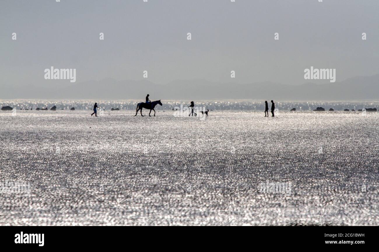 Walking beach heat haze hi-res stock photography and images - Alamy
