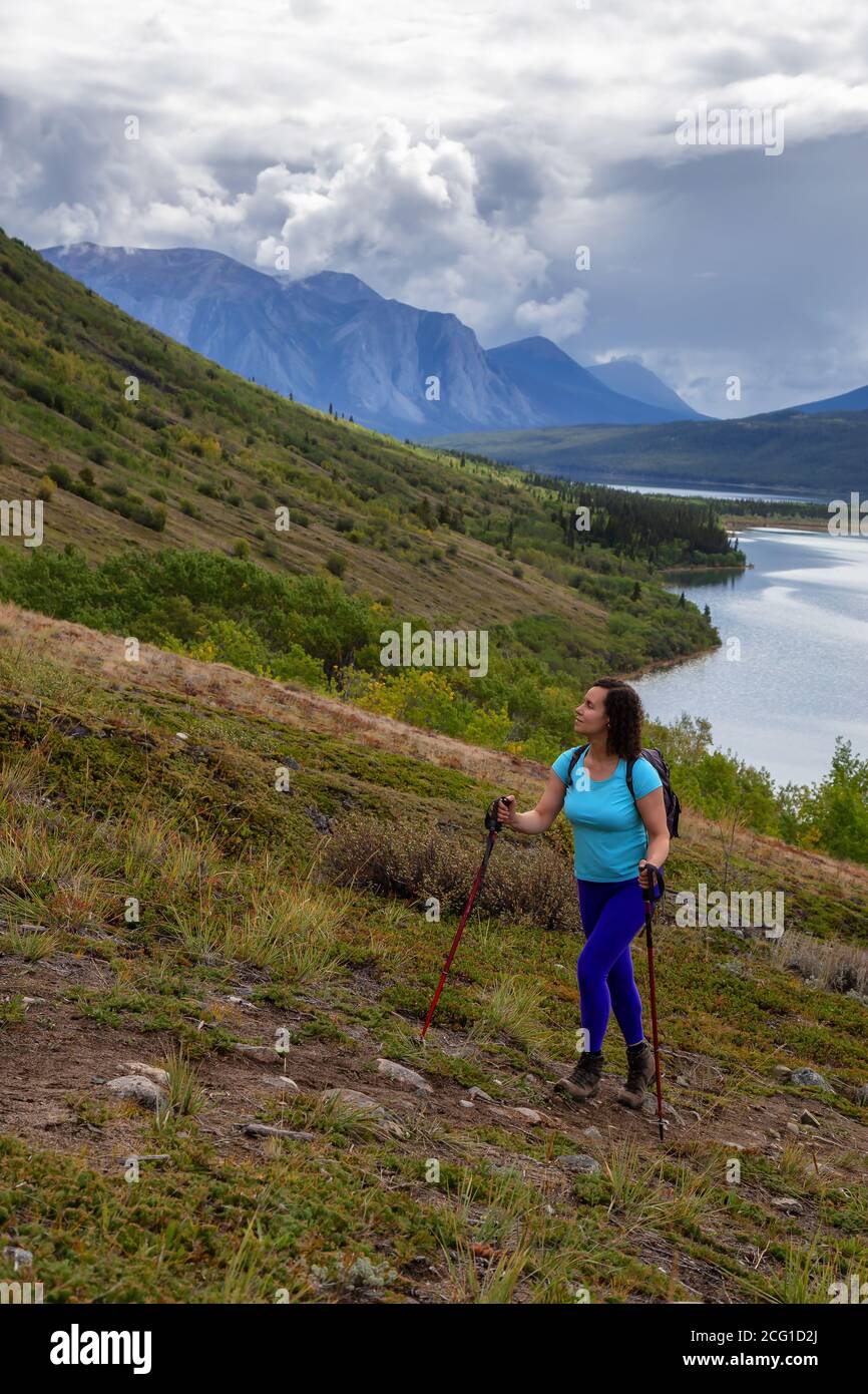 Adventurous Girl Hiking up the Nares Mountain Stock Photo - Alamy