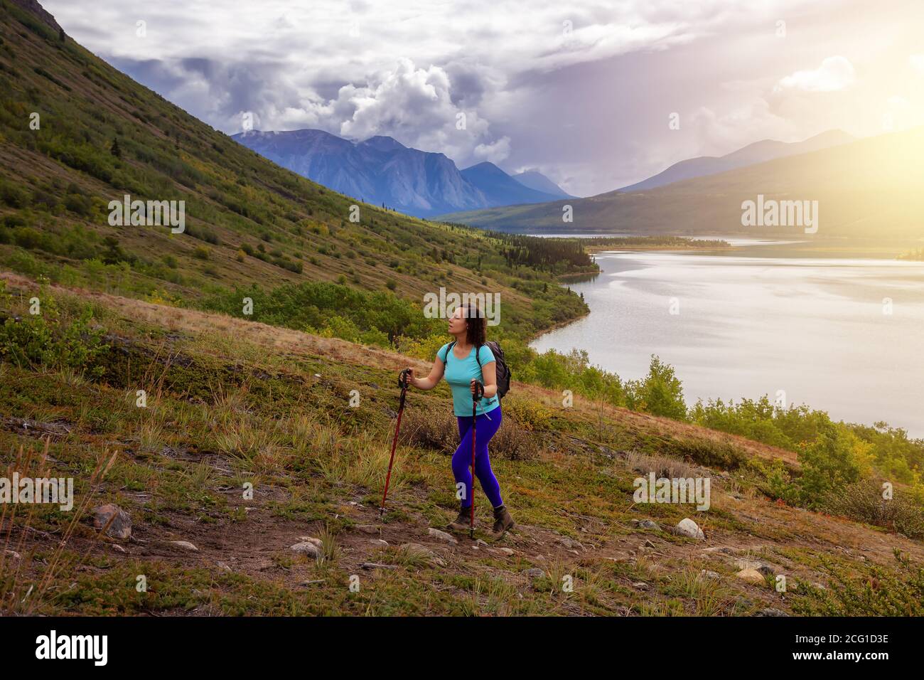 Adventurous Girl Hiking up the Nares Mountain Stock Photo - Alamy