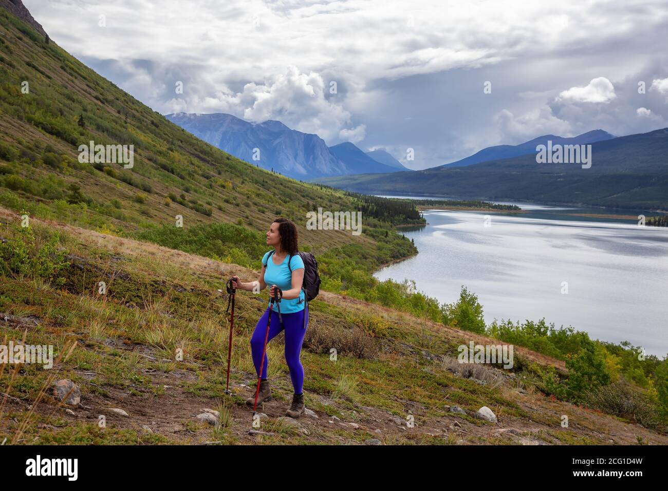 Adventurous Girl Hiking up the Nares Mountain Stock Photo - Alamy