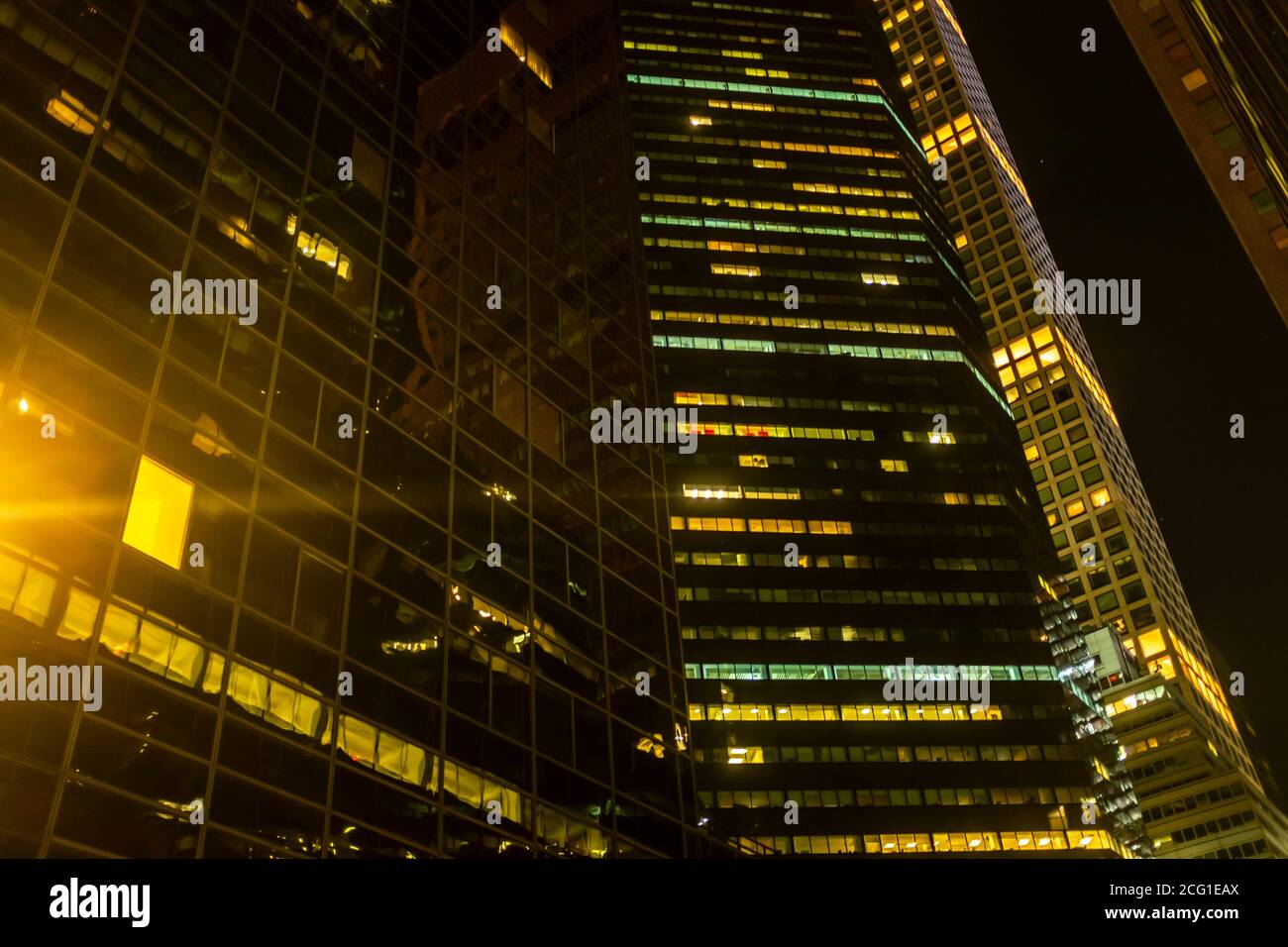 Buildings at night in the city Stock Photo - Alamy
