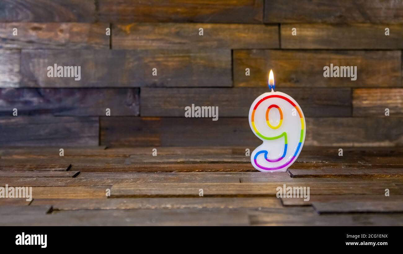 Birthday cake candle number nine hi-res stock photography and images ...