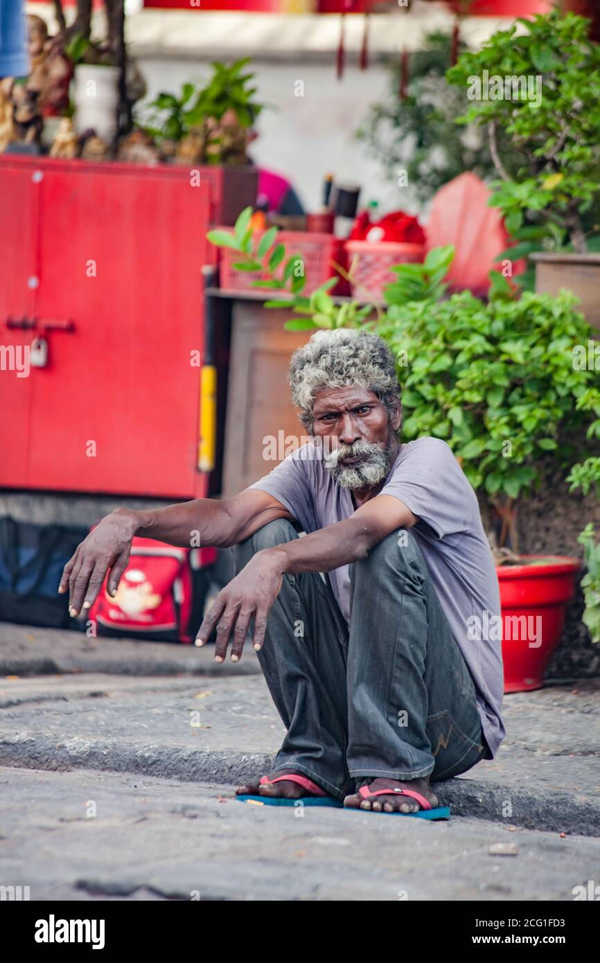 Begging change hi-res stock photography and images - Alamy