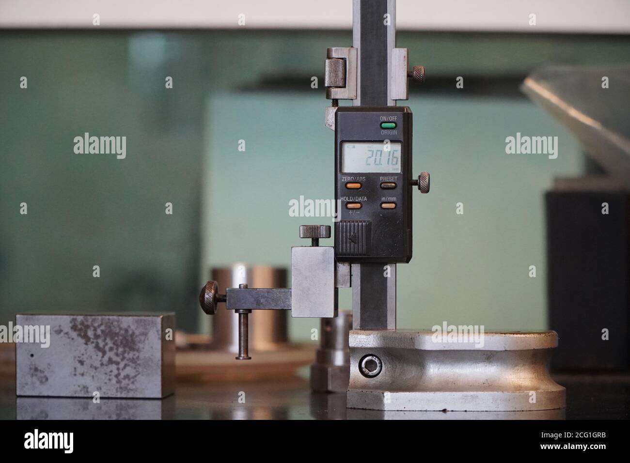 Caliper height gauge on surface plate and measure the product size on ...