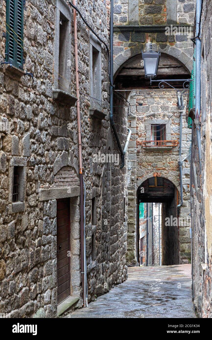 Alleyway in the old town with narrow alleys Stock Photo - Alamy