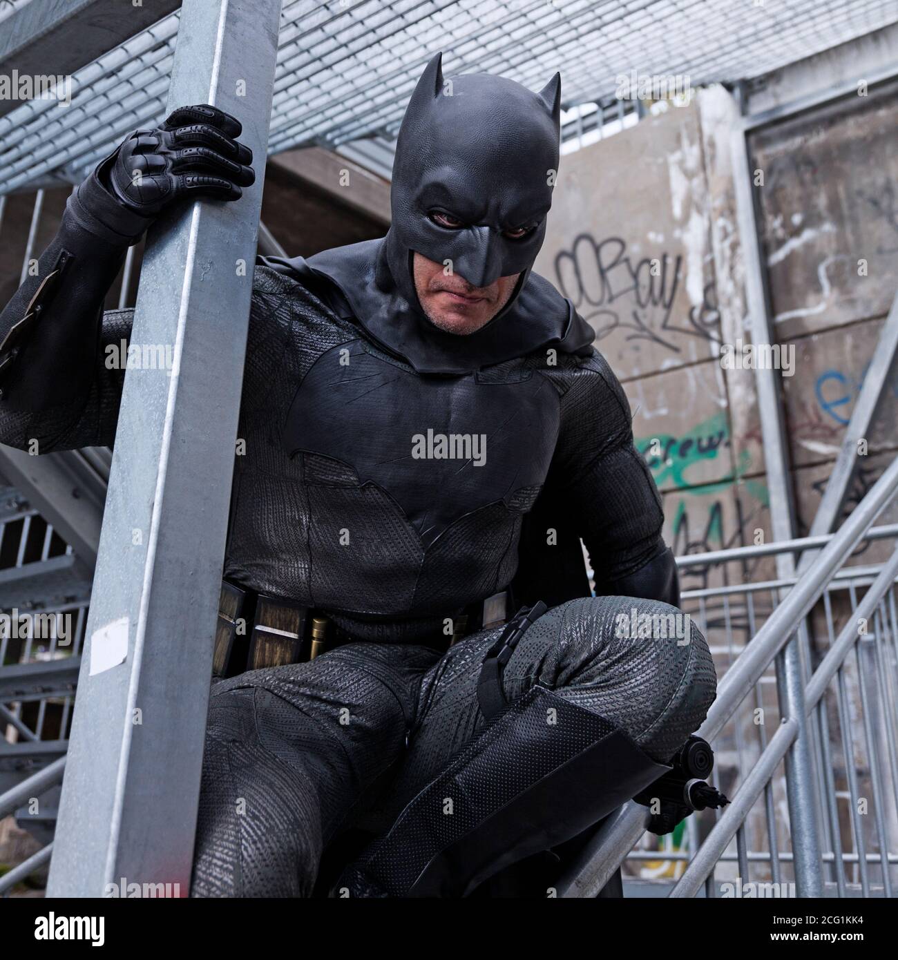Umea, Norrland Sweden - 5 September 2020: Batman is sitting on a stair ...
