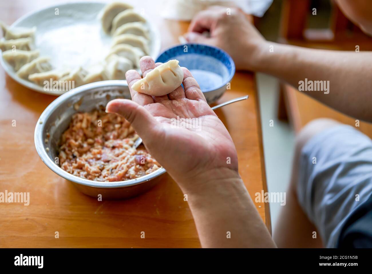 A chef is making dumplings Stock Photo - Alamy