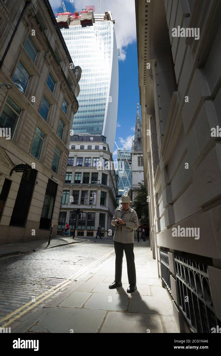 People being illuminate by the suns reflection from half-finished 37 ...