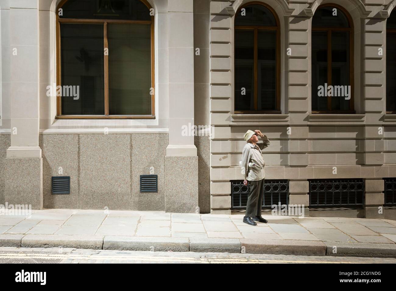 People being illuminate by the suns reflection from half-finished 37 ...