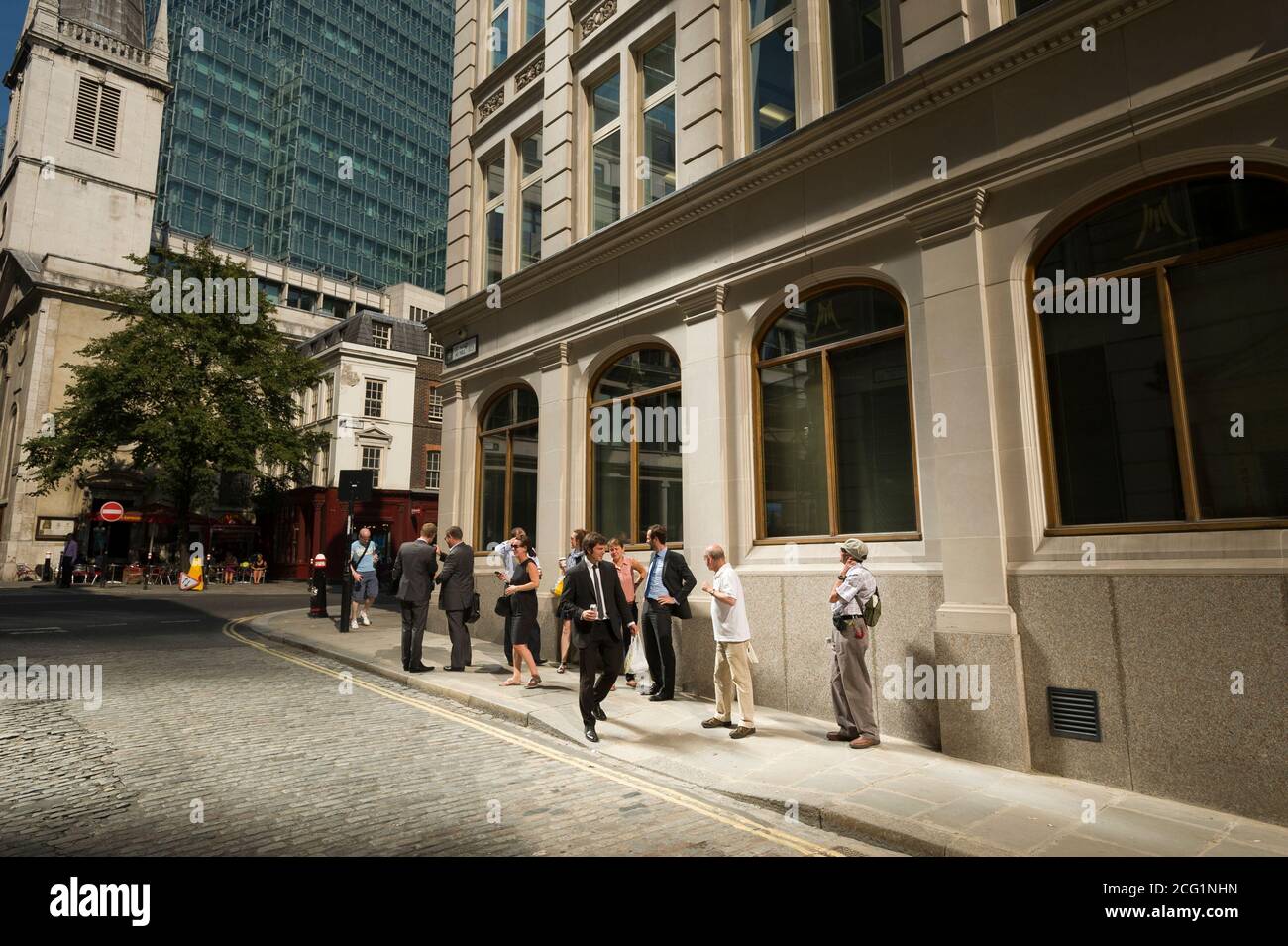 People being illuminate by the suns reflection from half-finished 37 ...