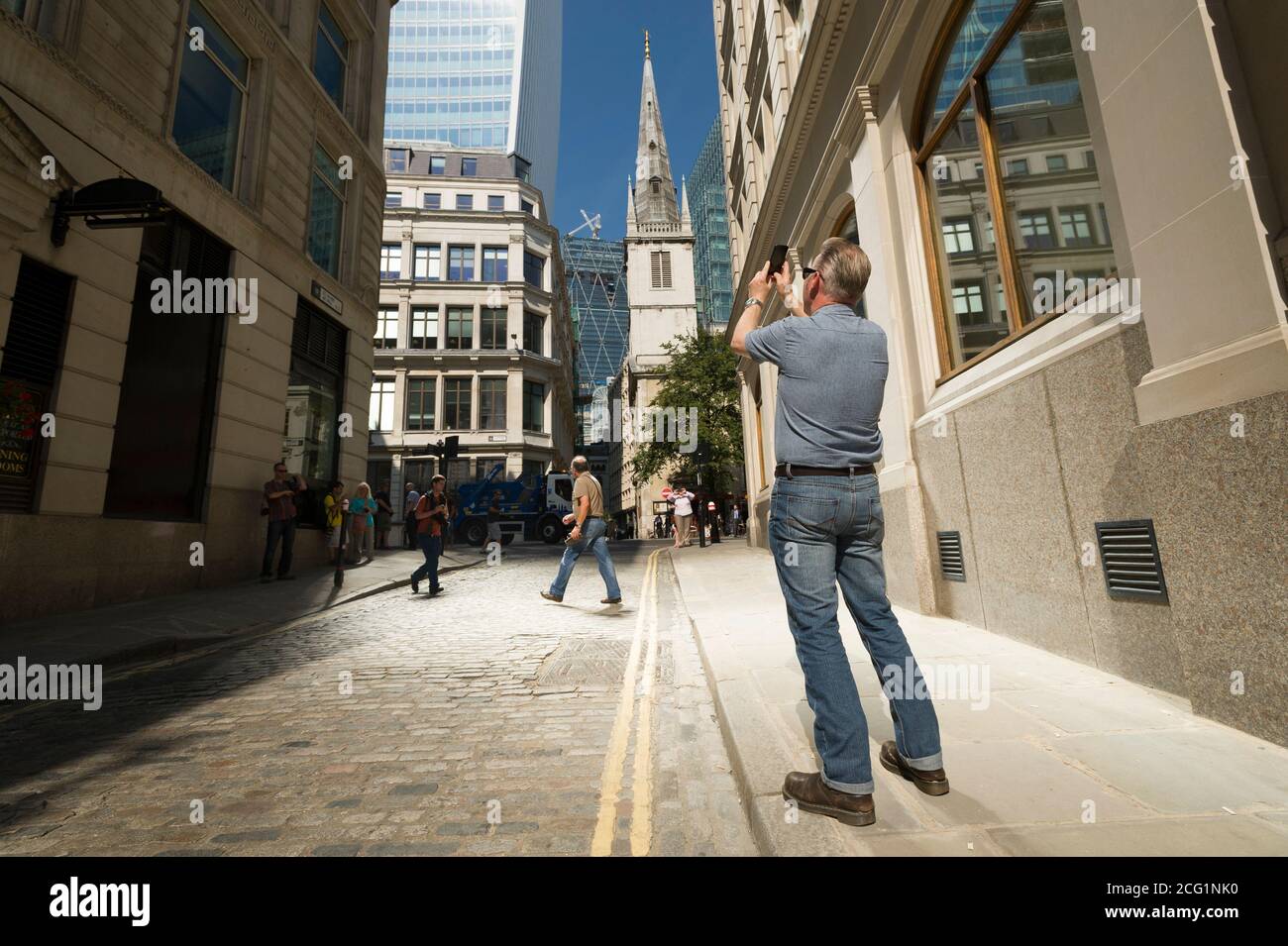 People being illuminate by the suns reflection from half-finished 37 ...