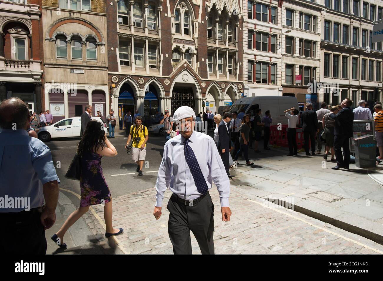 People being illuminate by the suns reflection from half-finished 37 ...