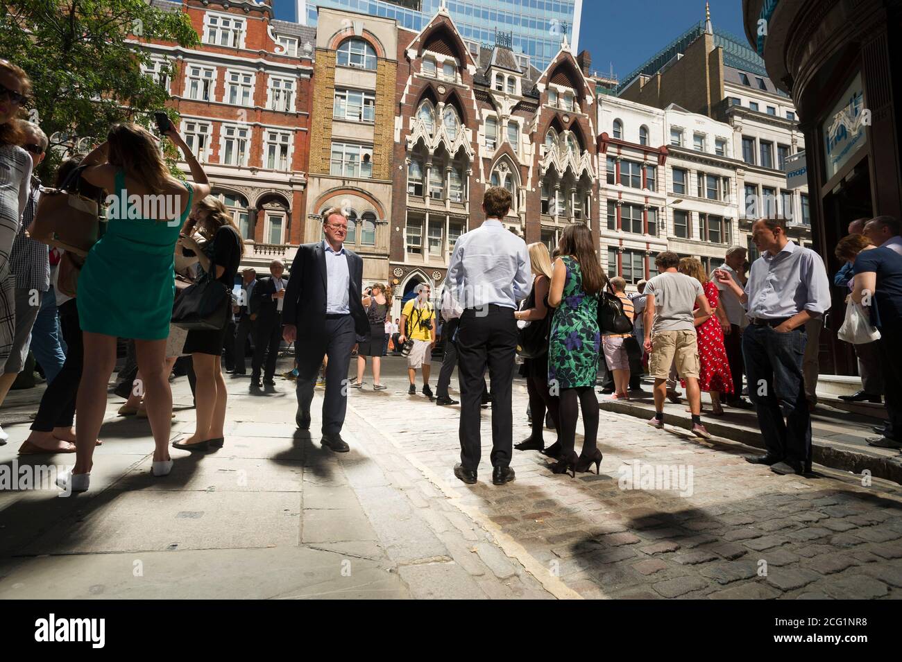 People being illuminate by the suns reflection from half-finished 37 ...