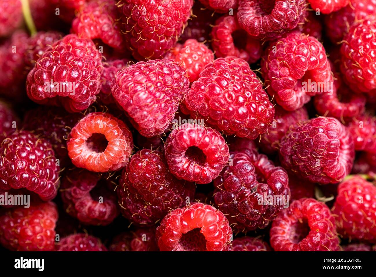Fresh and sweet red raspberries texture. fruit pile background Stock ...