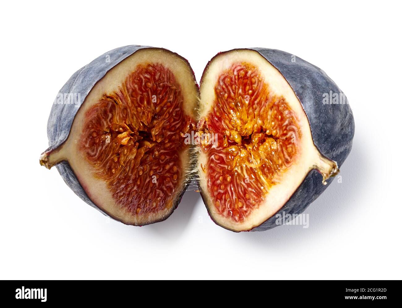 Halves of fig fruit isolated on white background. Top view of fig ...