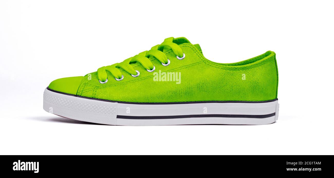 Single shoe isolated on white background - Green Stock Photo - Alamy