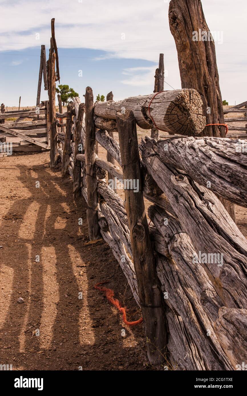 Detail of the wooden pole fence at a vintage cattle corral still in use ...