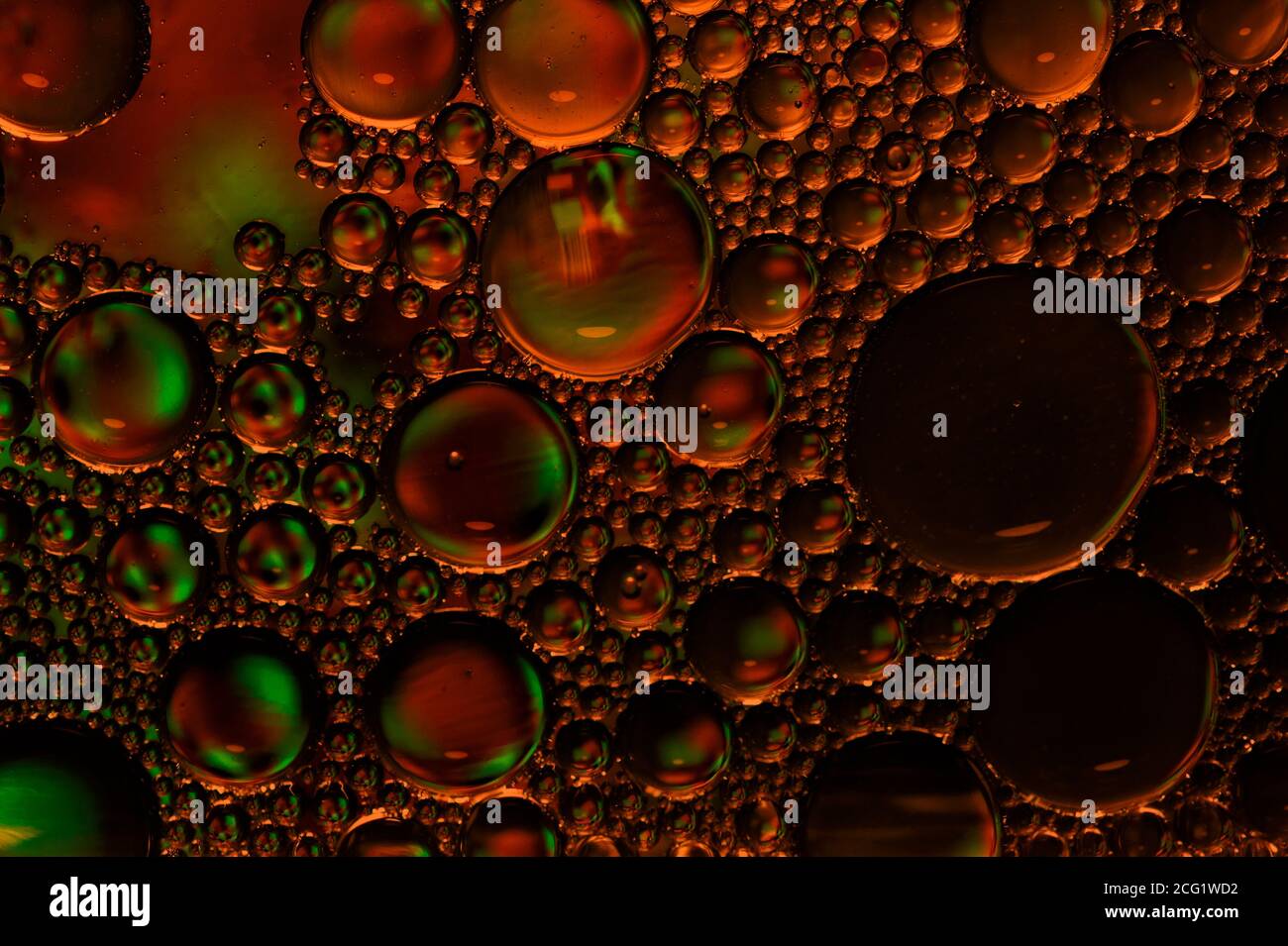 Artistic photo of oil drops close up in red tones for background Stock ...