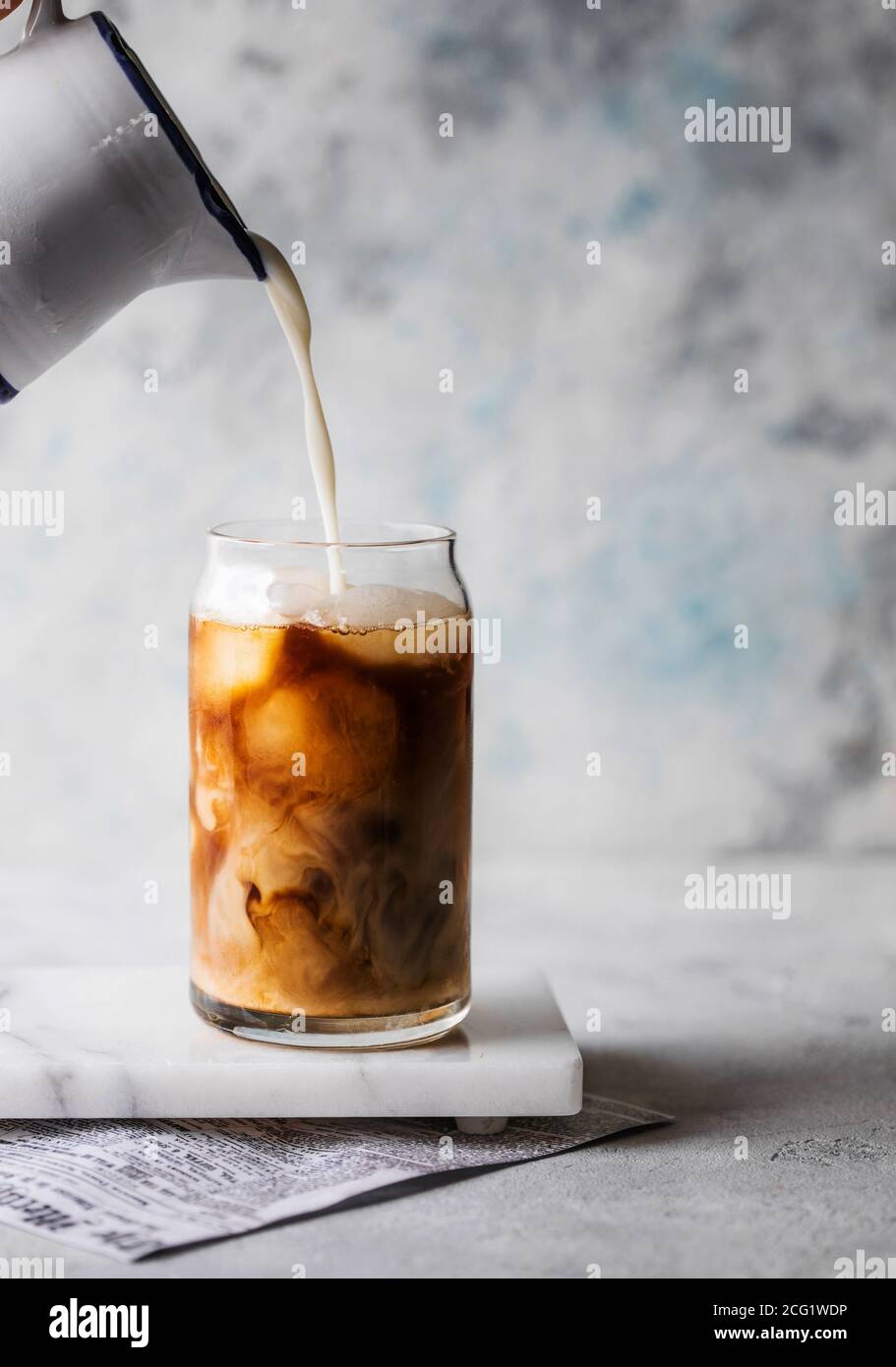 Tall glass milk blue background hi-res stock photography and images - Alamy