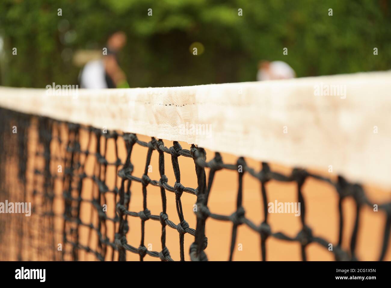 Clay tennis court with net, close up Stock Photo - Alamy