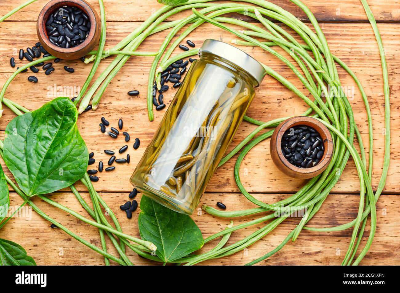 Cowpea pods with beans and a jar of canned cowpea.Vegetable plant Stock ...